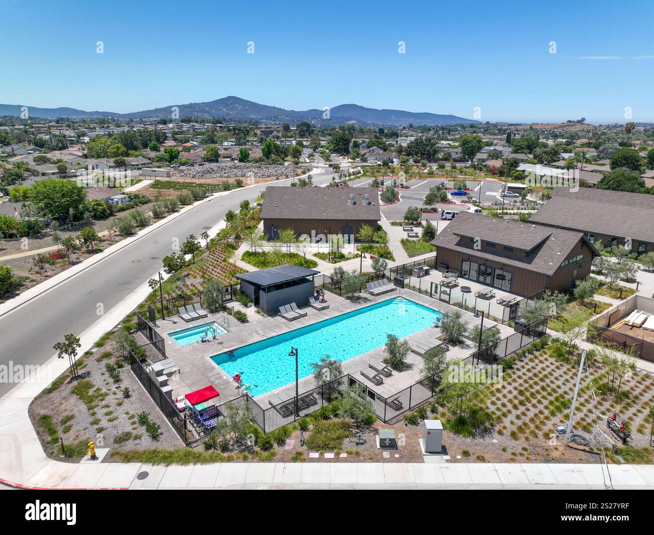 Aerial video of recreational facilities with pool in private ...