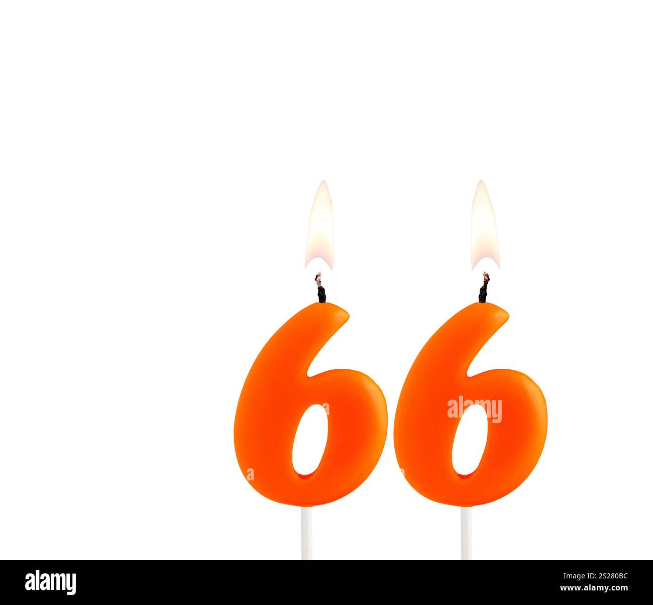 Orange birthday candle on white background - Number 66 Stock Photo - Alamy