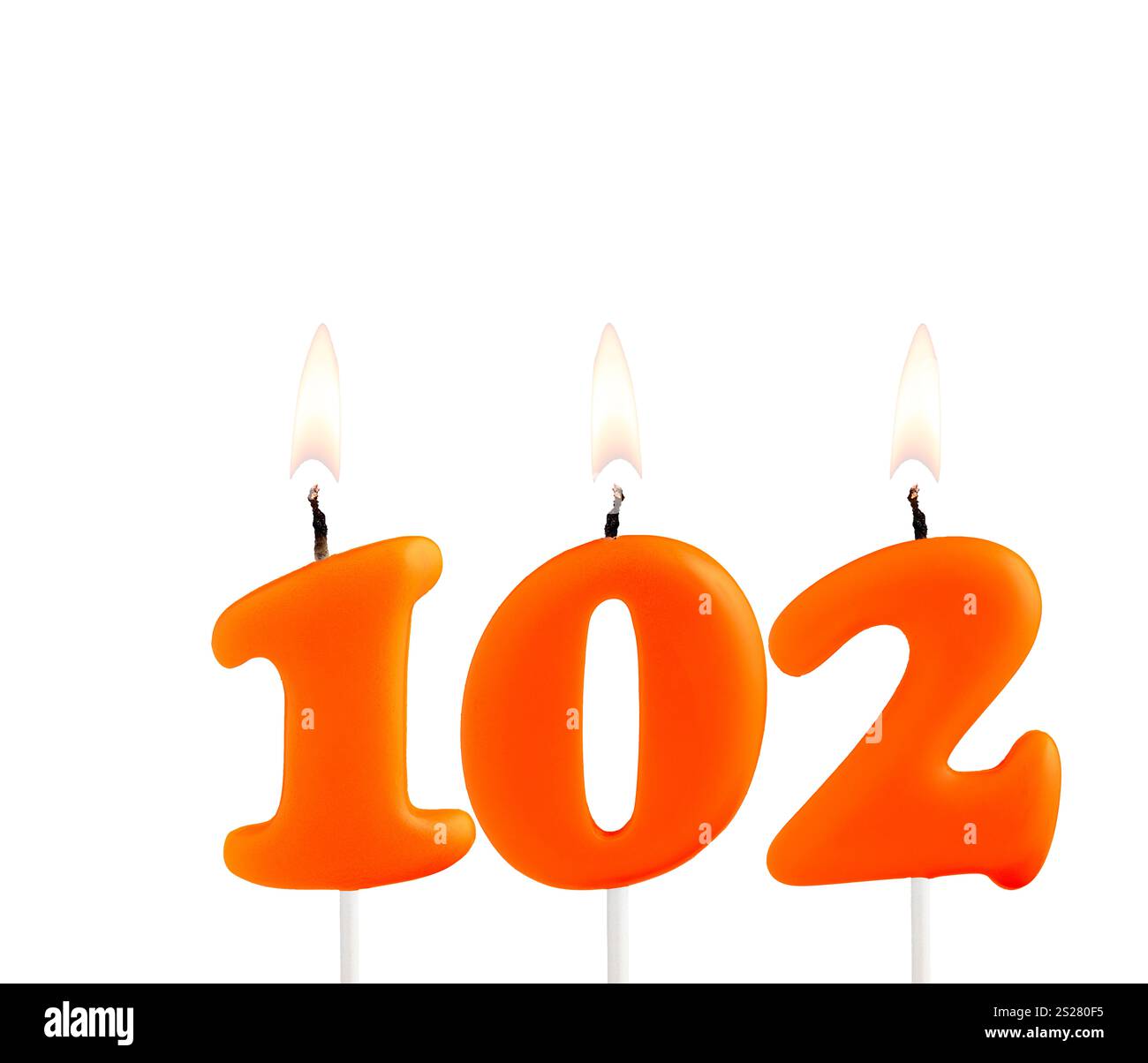 Orange birthday candle on white background - Number 102 Stock Photo - Alamy