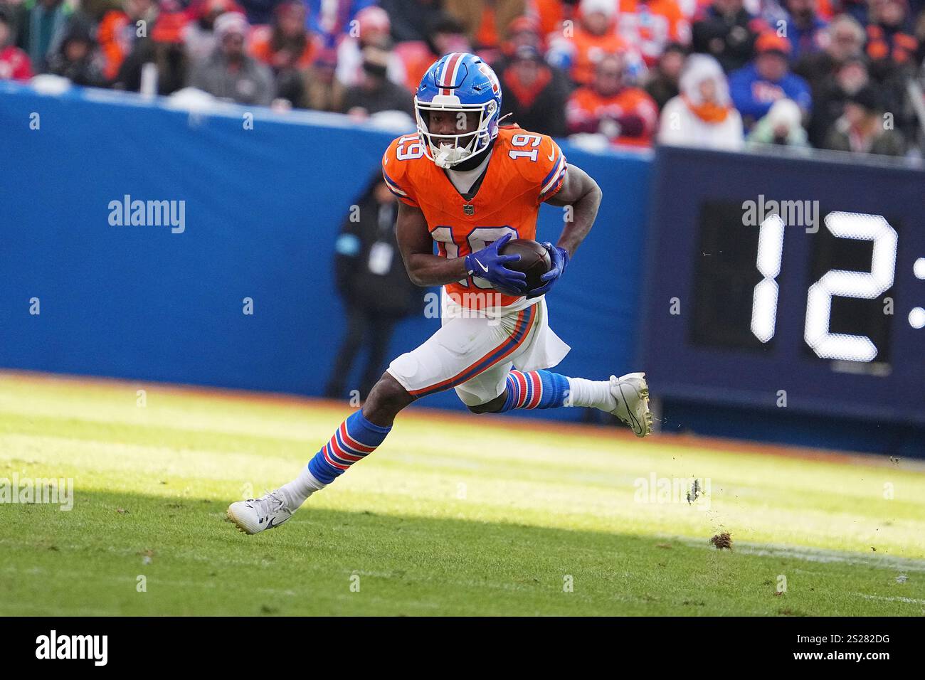 Denver Broncos wide receiver Marvin Mims Jr. (19) runs with the ball ...