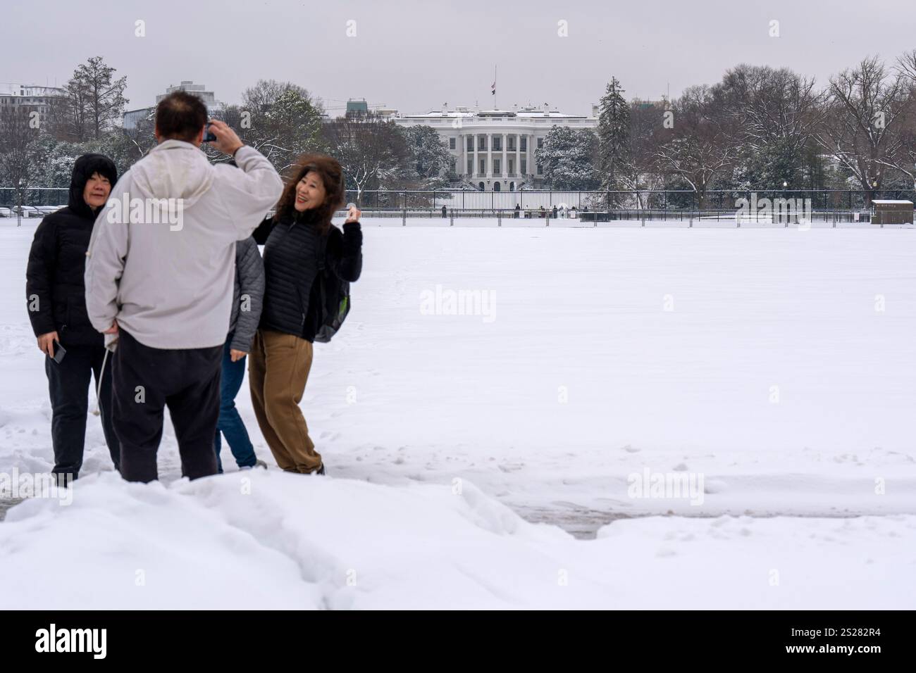 People take photographs of each other on the Ellipse with the White ...