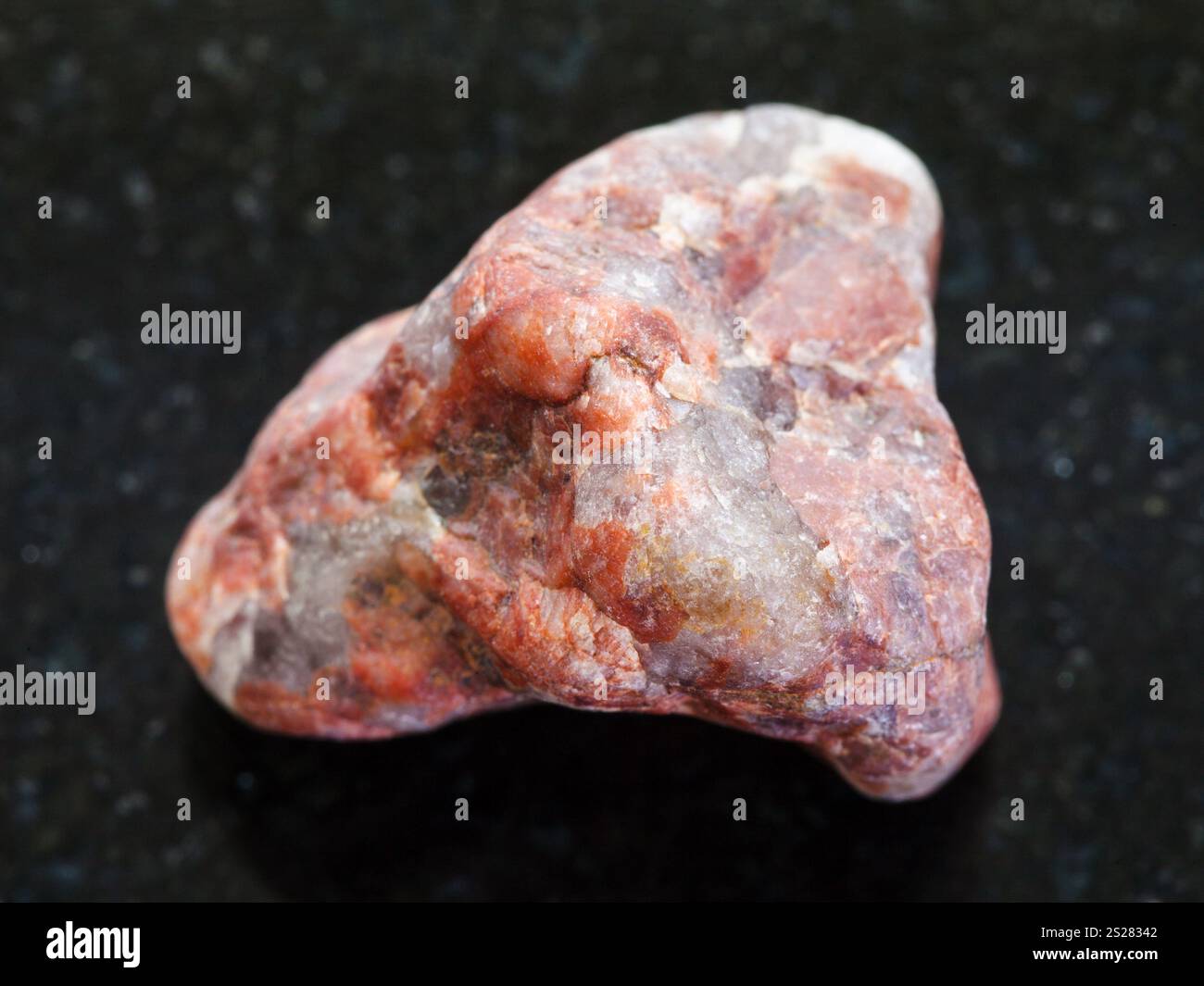 macro shooting of natural mineral rock specimen - piece of Pegmatite ...