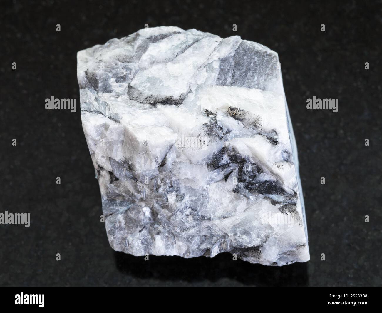 macro shooting of natural mineral rock specimen - rough magnesite stone ...