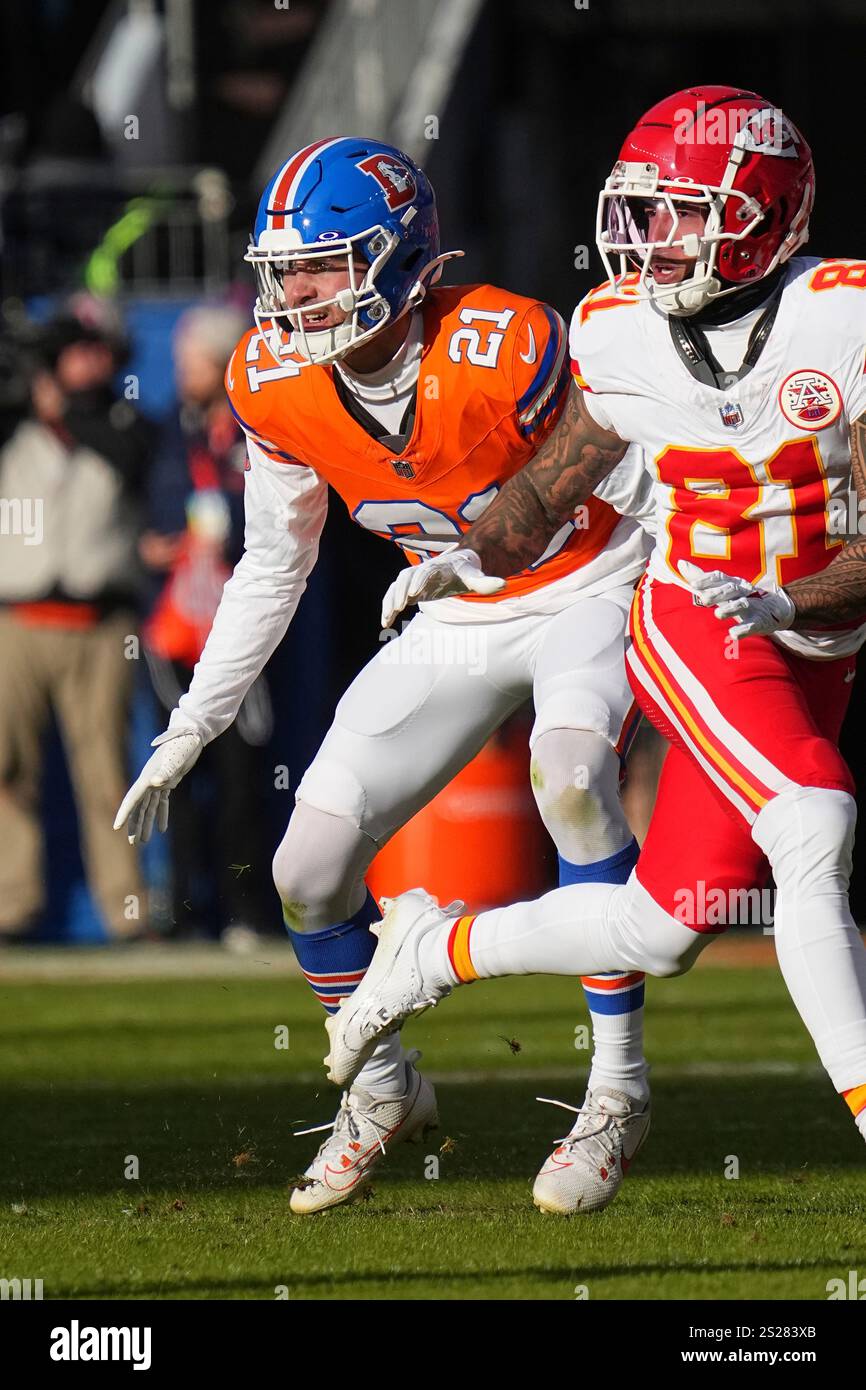 Denver Broncos cornerback Riley Moss (21) runs a play against the ...
