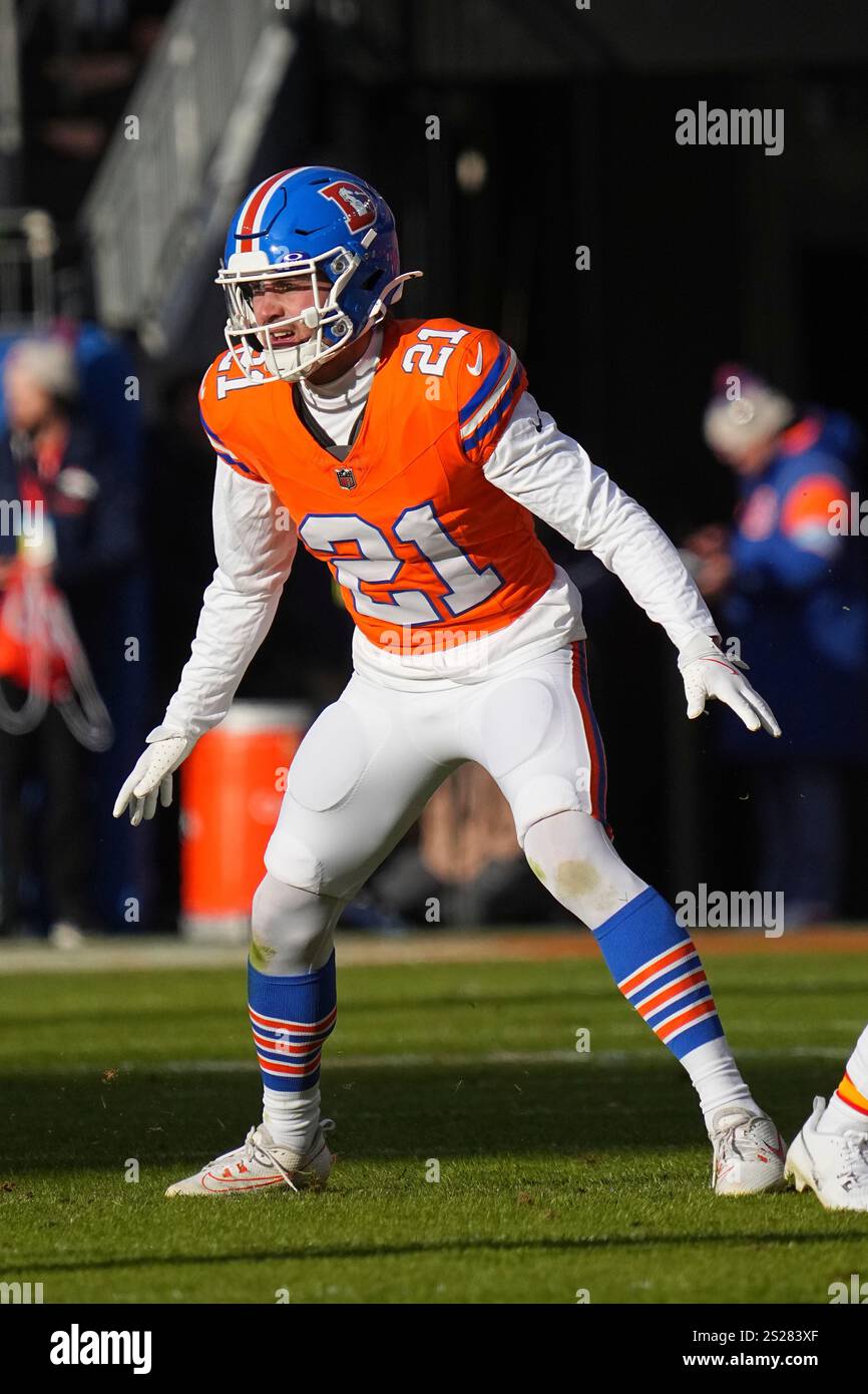 Denver Broncos cornerback Riley Moss (21) runs a play against the ...