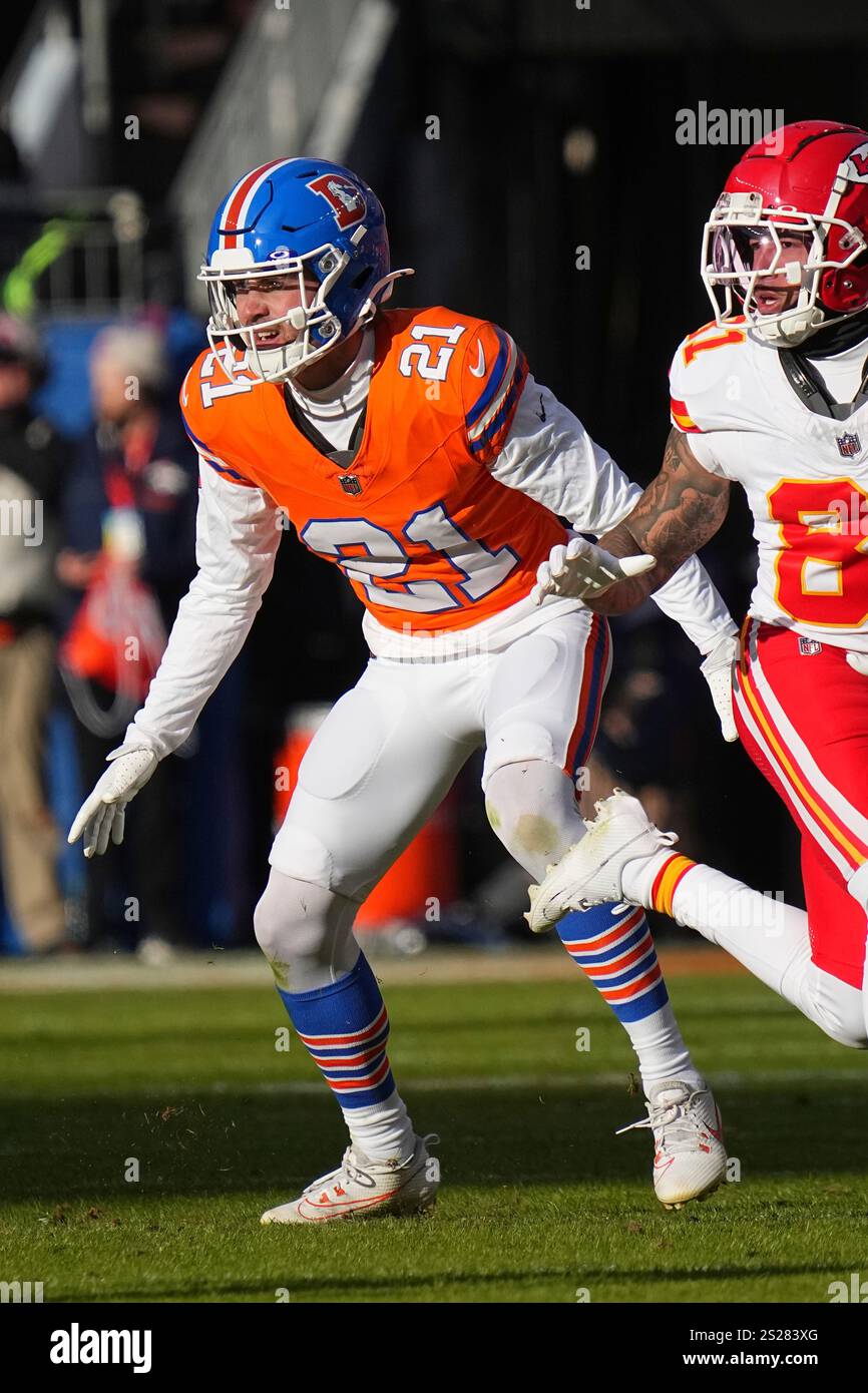 Denver Broncos cornerback Riley Moss (21) runs a play against the ...