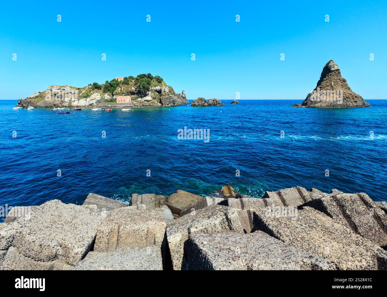Lachea Island on Cyclopean Coast and the Islands of the Cyclops on Aci Trezza town (Italy ...