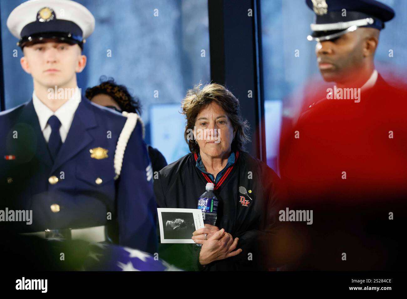 Mourners view the casket of former President Jimmy Carter as he lies in ...