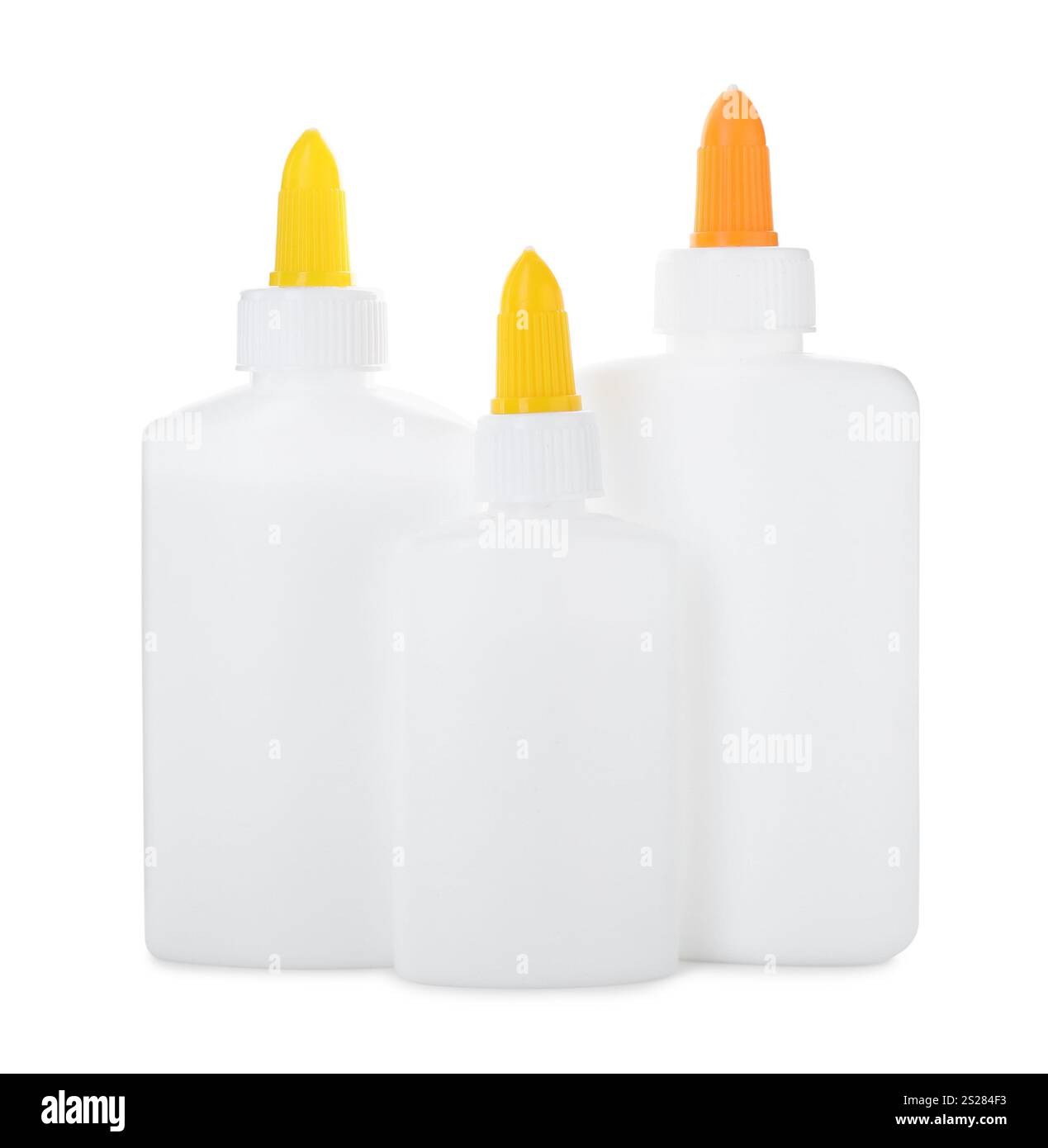 Bottles of glue with caps isolated on white Stock Photo - Alamy