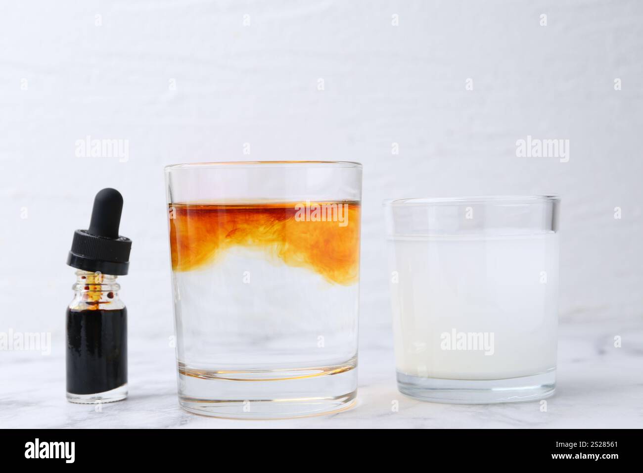 Iodine starch test. Bottle of aqueous iodine, glasses with water ...