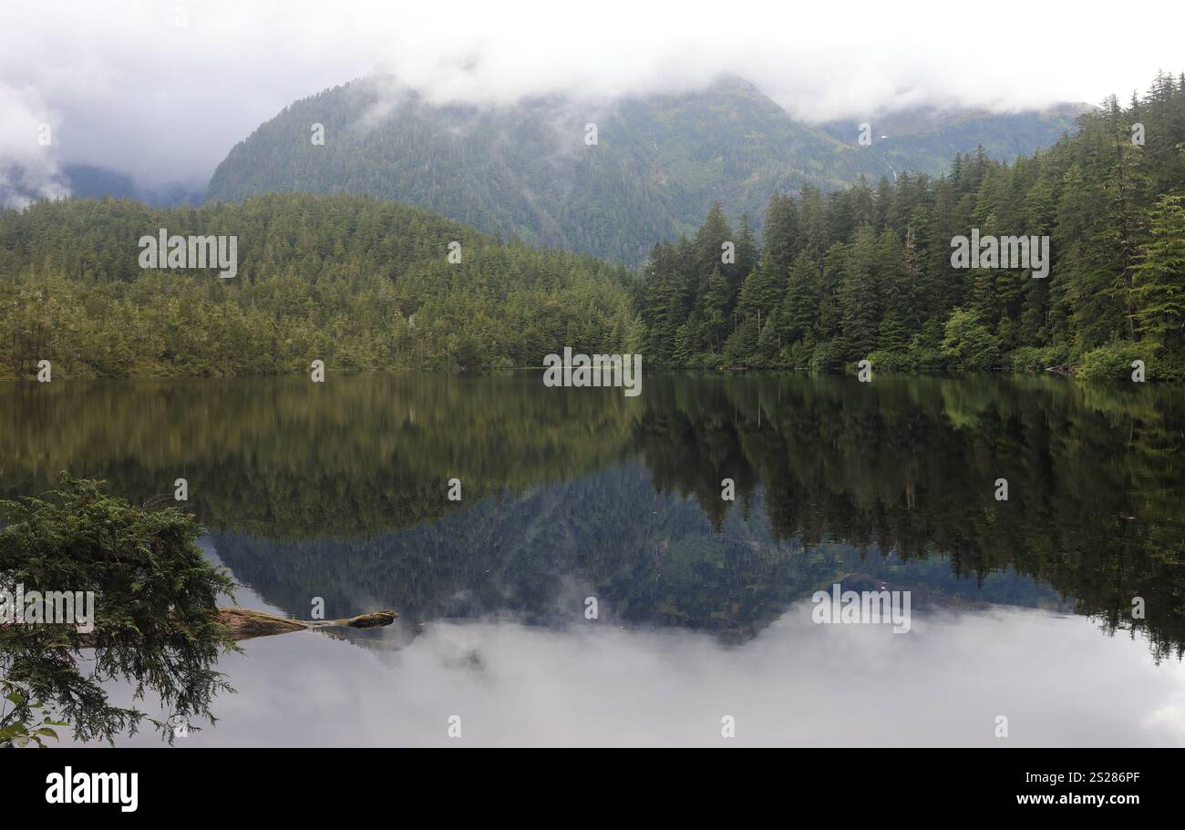 Blue lake reflection Stock Photo - Alamy