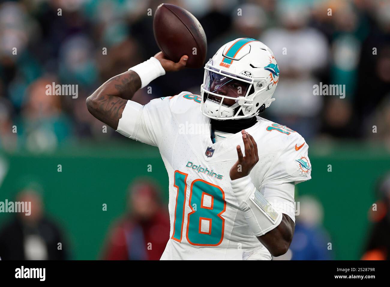 Miami Dolphins quarterback Tyler Huntley (18) passes the ball during an ...