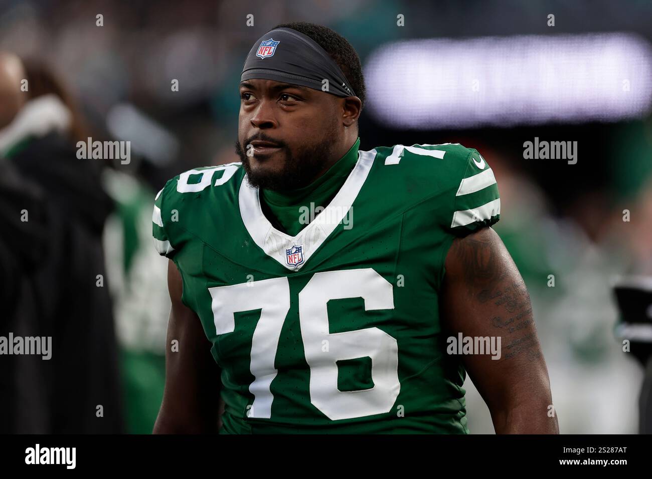 New York Jets guard John Simpson (76) before an NFL football game ...