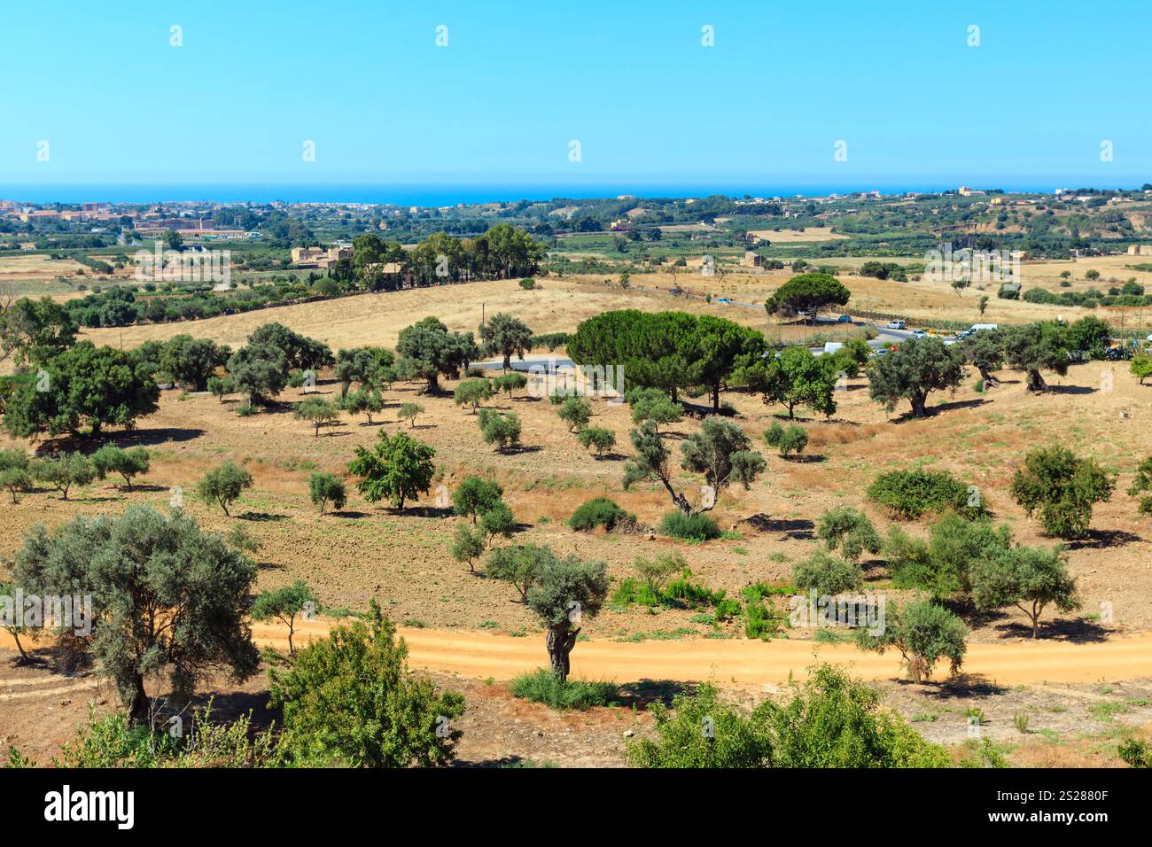 View to road, gardens and sea from famous ancient ruins in Valley of ...