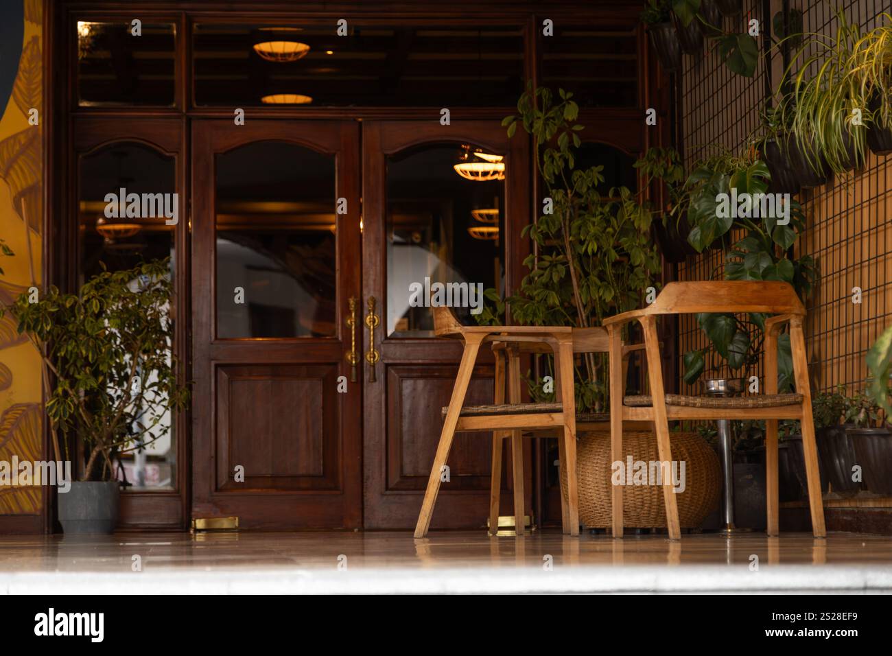 An elegant and classic wooden entrance to a bar or restaurant ...