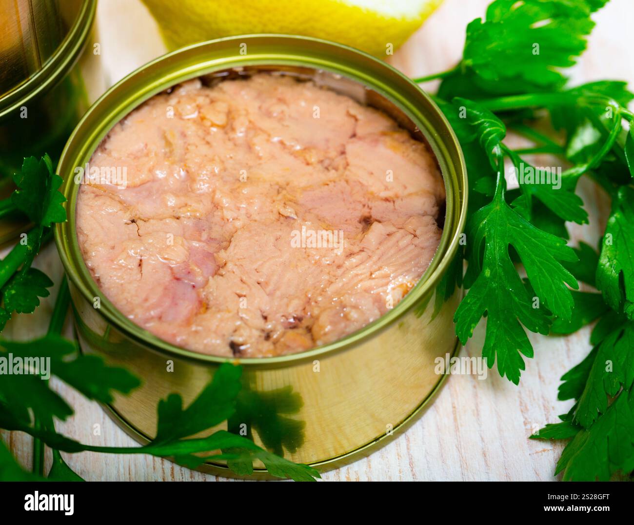 Open tin can of tuna in oil Stock Photo - Alamy