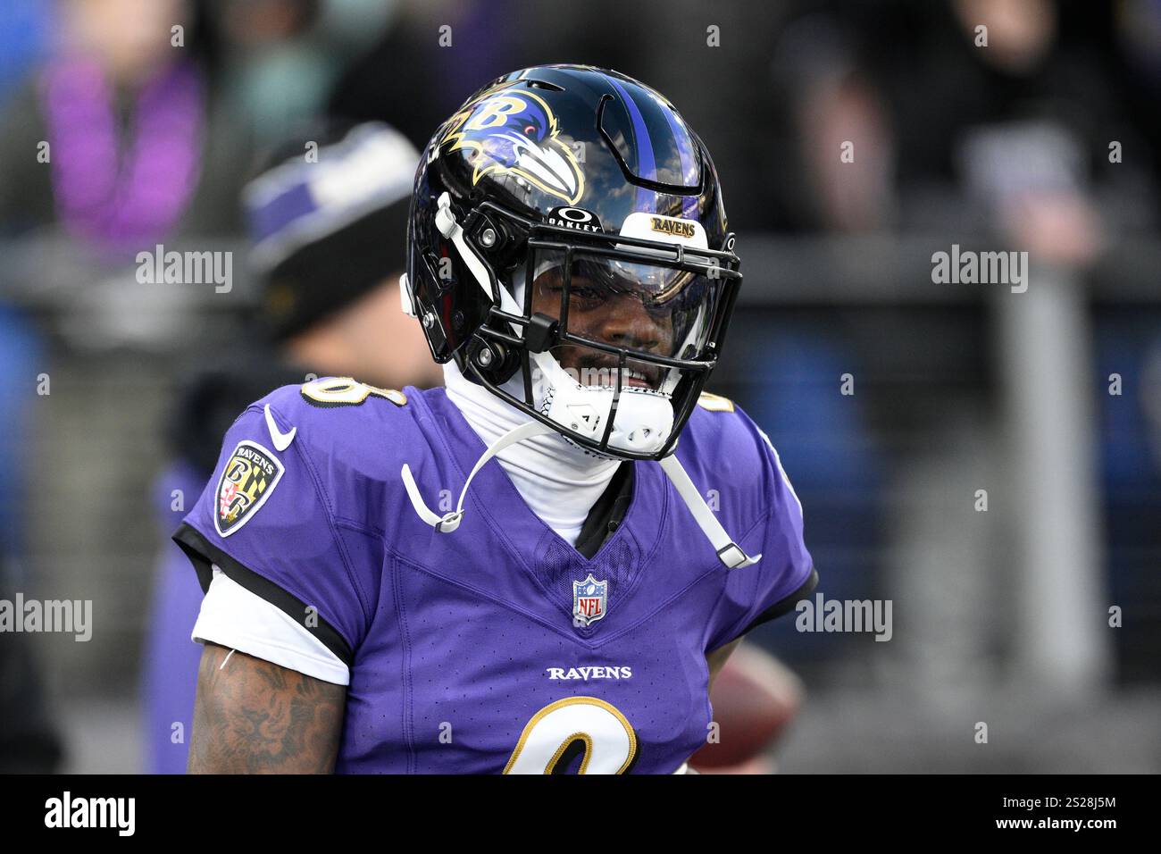 Baltimore Ravens quarterback Lamar Jackson (8) works out before an NFL ...