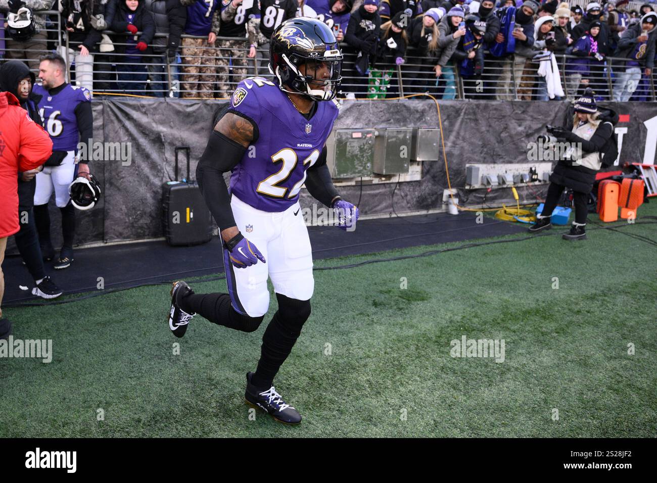 Baltimore Ravens running back Derrick Henry (22) takes to the field to ...