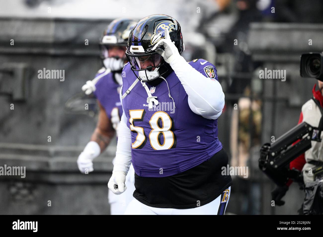 Baltimore Ravens defensive tackle Michael Pierce (58) takes to the ...