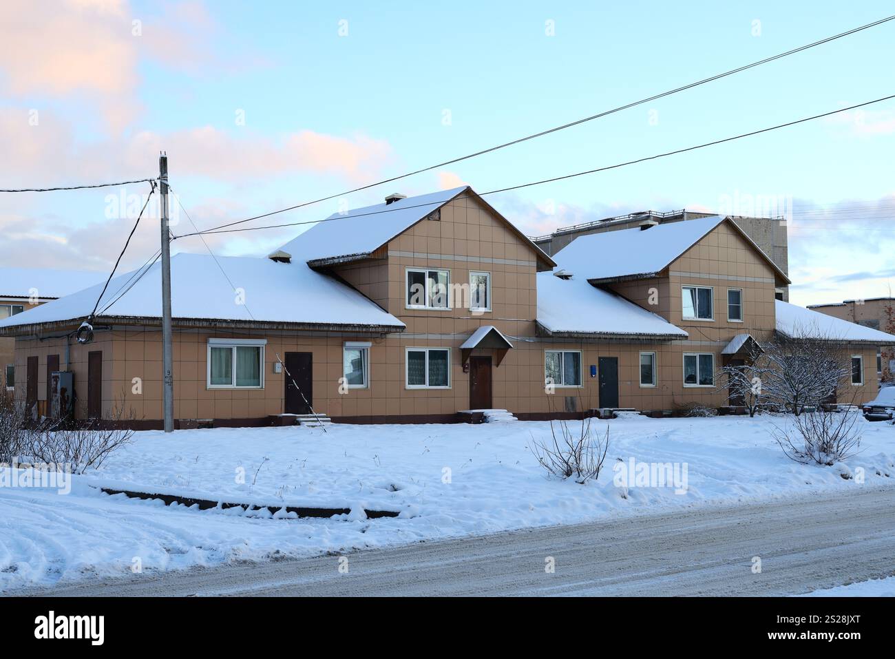 A Beautiful SnowCovered Residential Area in Winter with Scenic Views of ...
