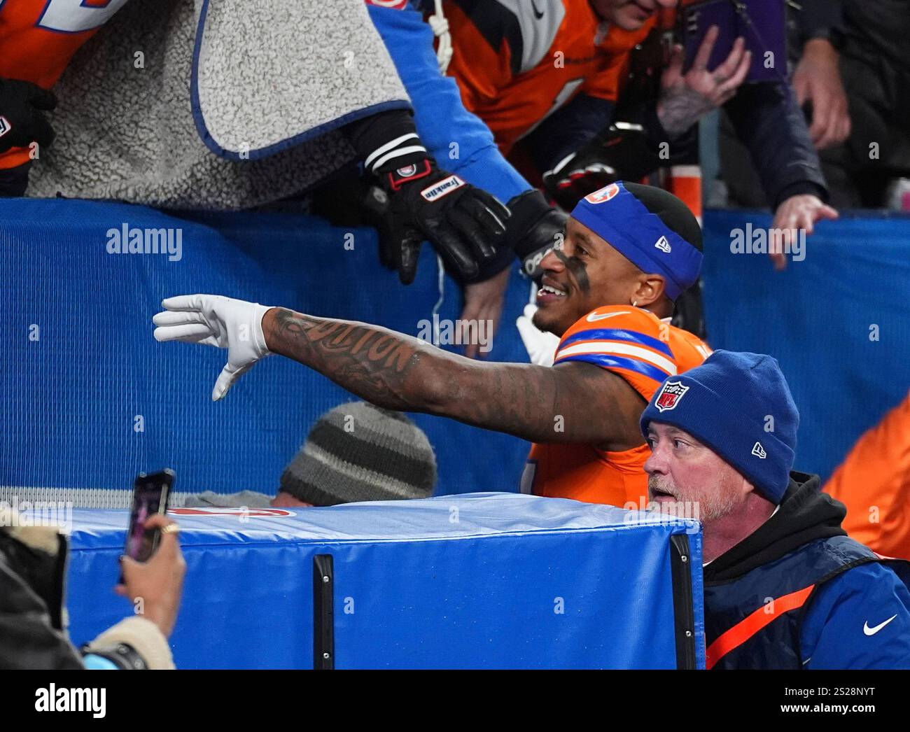 Fans congratulate Denver Broncos wide receiver Courtland Sutton (14 ...