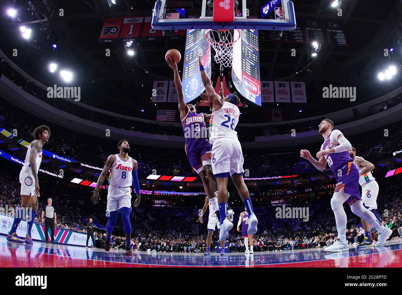 Phoenix Suns' Bradley Beal (3) goes up for a shot against Philadelphia ...