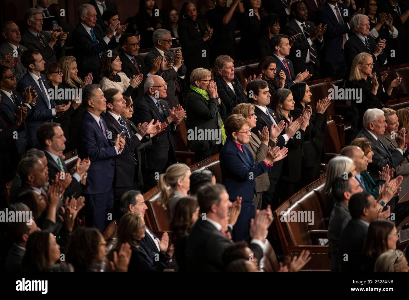 Members of Congress stand and applaud at the conclusion of the counting ...
