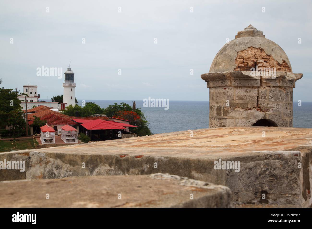 The 18m high Faro del Morro lighthouse from 1914 and Castillo del Morro ...