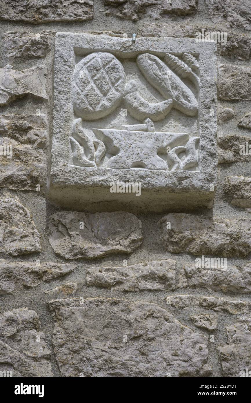 Stone guild sign of the bakers, La Cavalerie, Aveyron, France, Europe ...