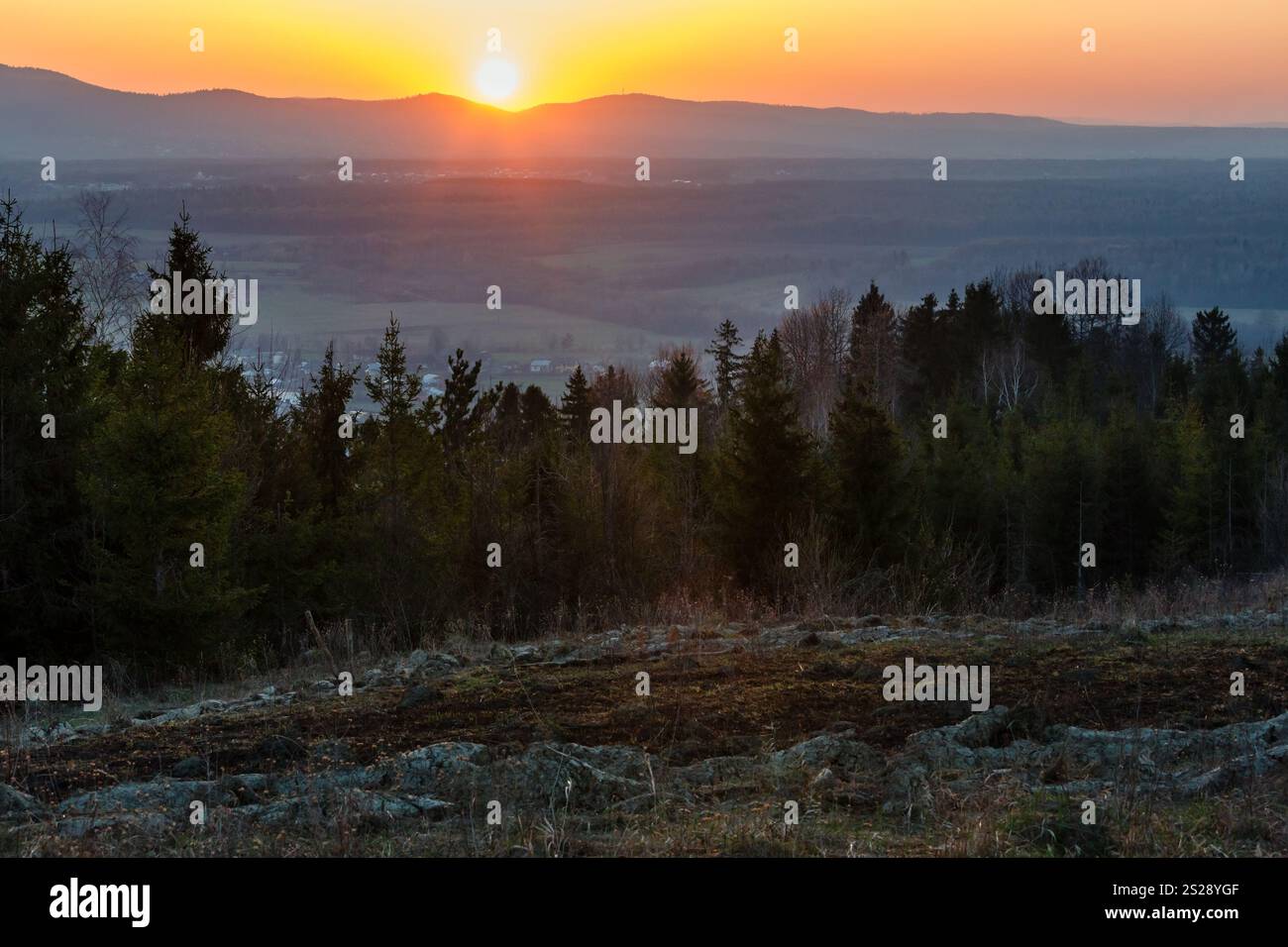 Spring evening sunset pre mountain countryside view with forests ...