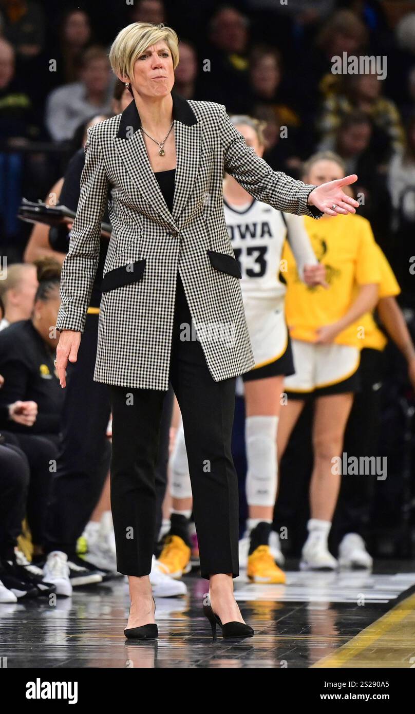IOWA CITY, IA - JANUARY 05: Iowa coach Jan Jenson watches her team play ...