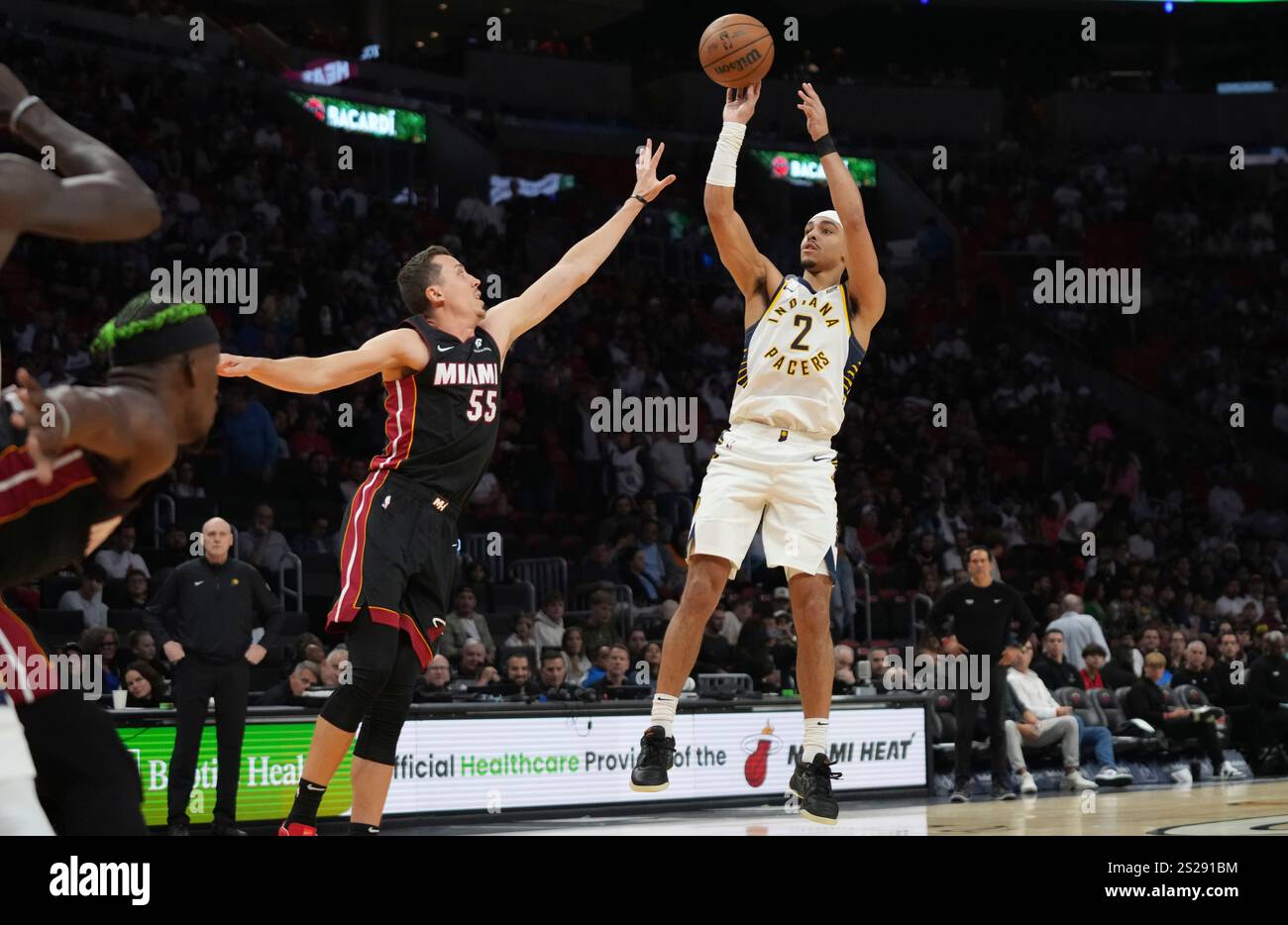 Indiana Pacers guard Andrew Nembhard (2) shoots as Miami Heat forward Duncan Robinson (55 ...