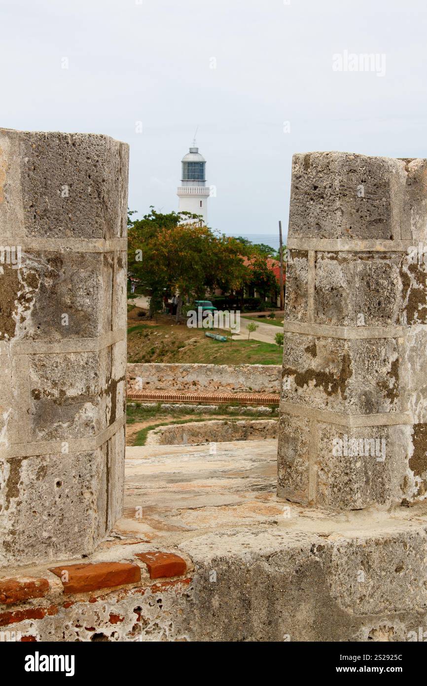 The 18m high Faro del Morro lighthouse from 1914 and Castillo del Morro ...