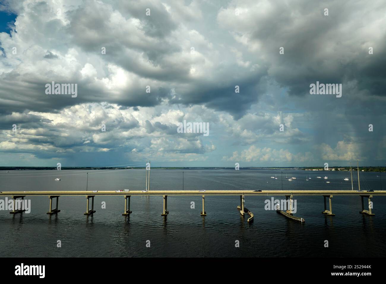Barron Collier Bridge and Gilchrist Bridge in Florida with moving ...