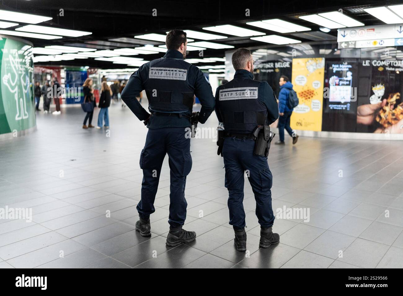 RATP security officers are seen observing the concourse during a visit ...