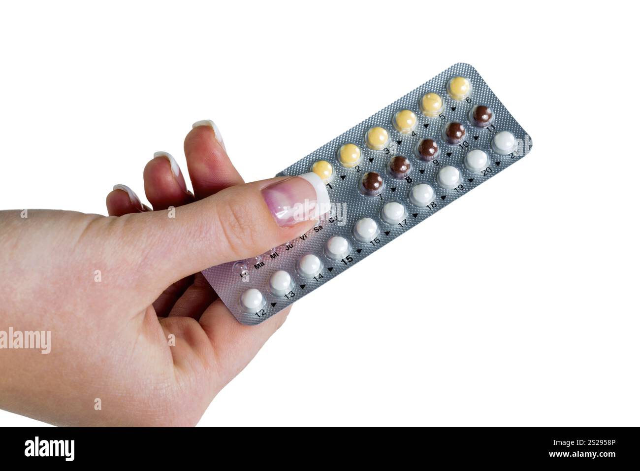 A hand holding birth control pills. Symbolic photo for contraception ...
