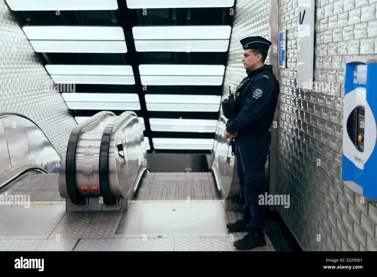 Police officers are seen observing the concourse during a visit by the ...