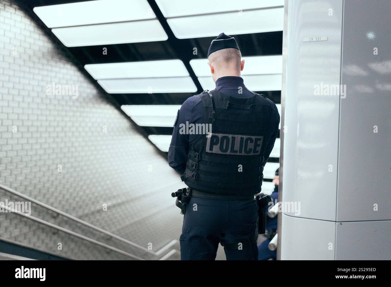 Police officers are seen observing the concourse during a visit by the ...