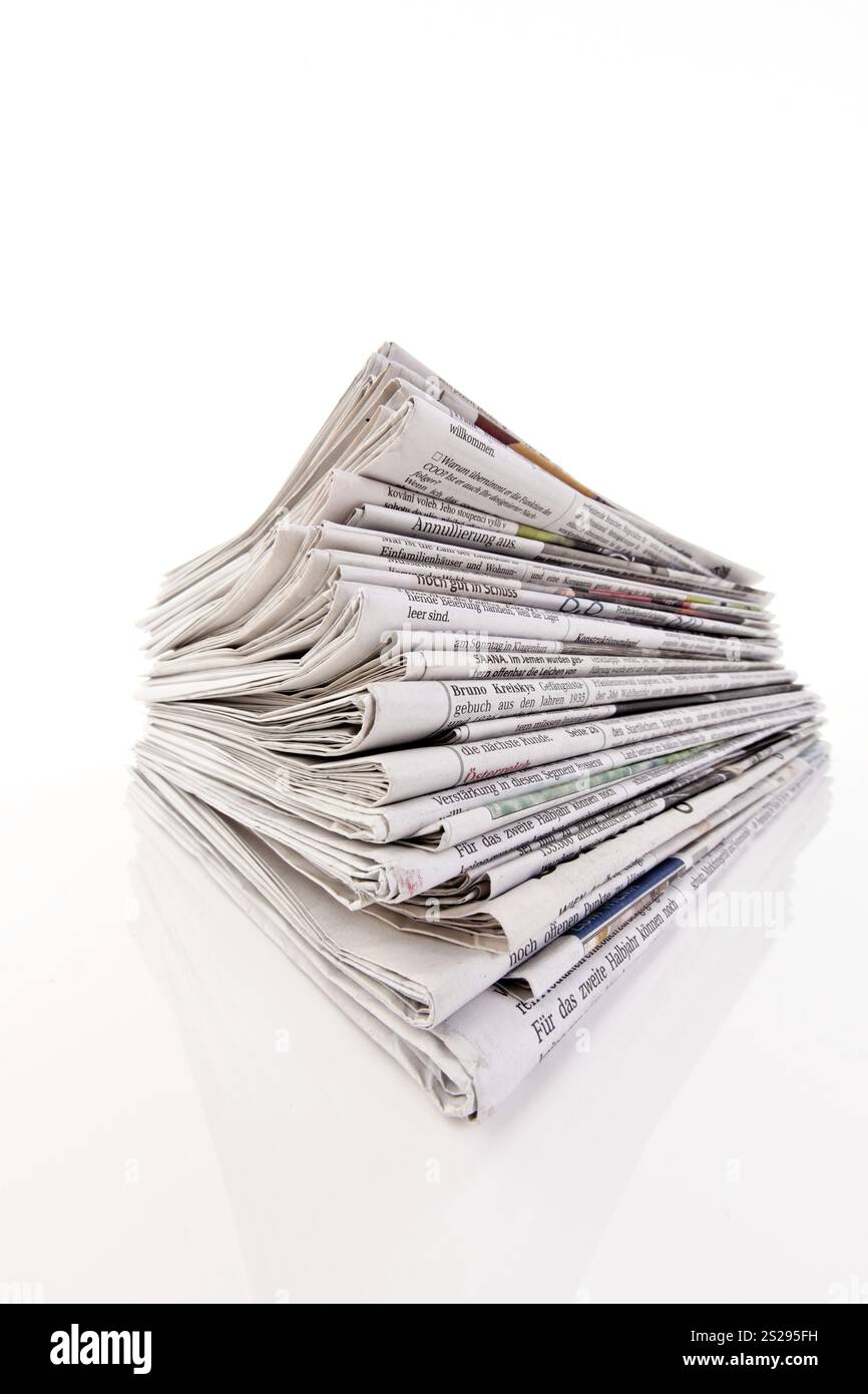 Old newspapers and magazines in a pile Austria Stock Photo - Alamy