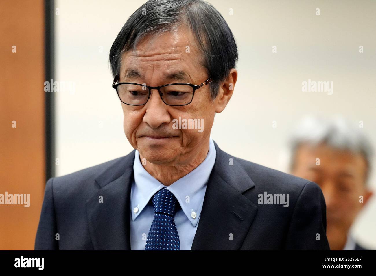 Eiji Hashimoto, chairman and CEO of Nippon Steel Corporation, walks to ...