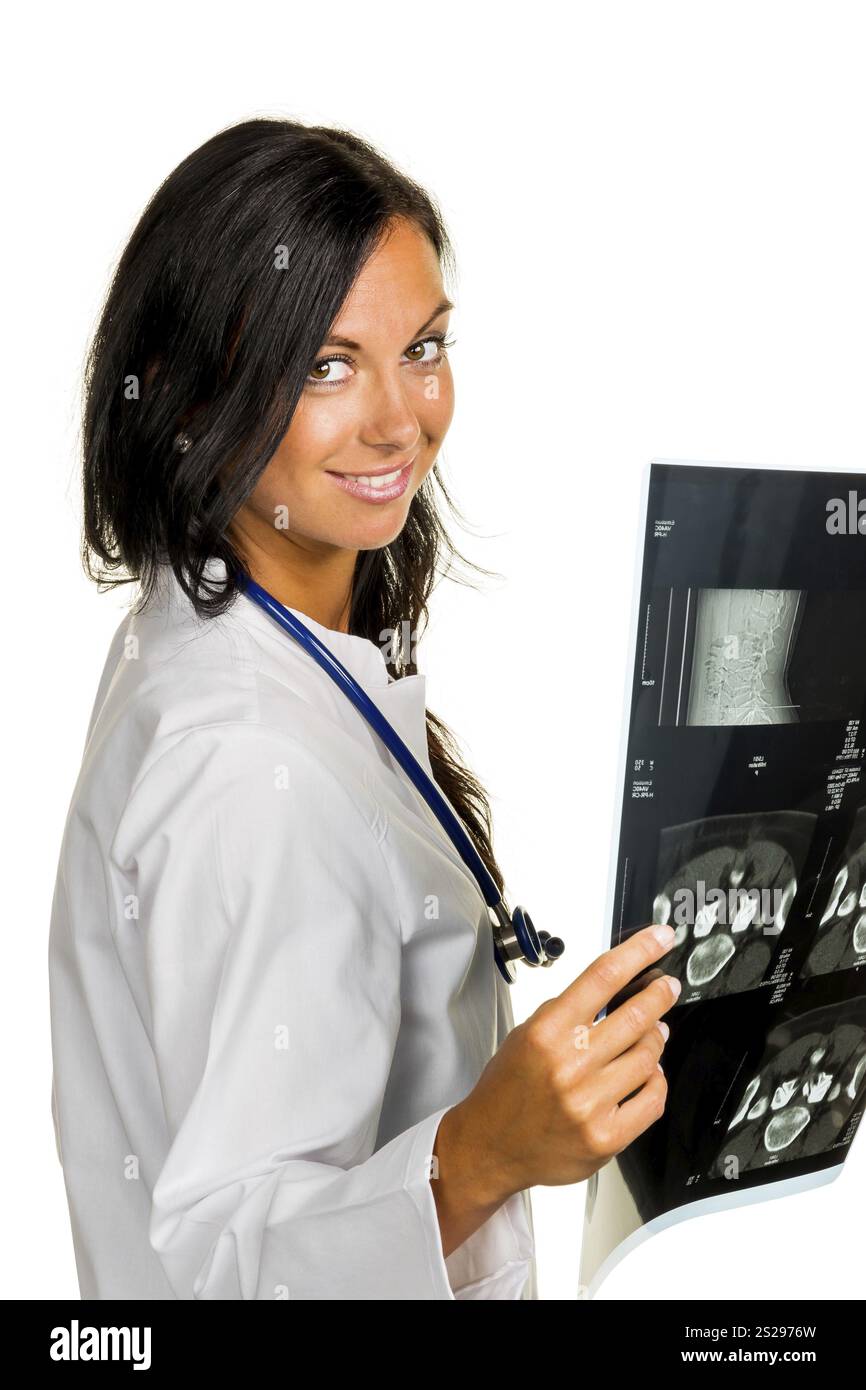 A doctor holds the X-ray image of an intervertebral disc infiltration ...
