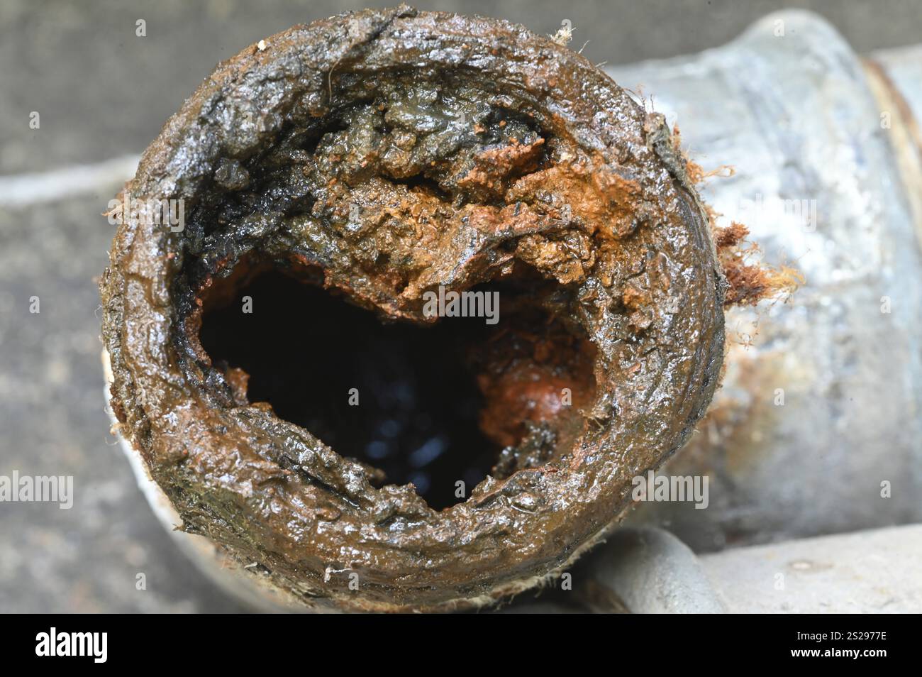 Dirty water pipe Stock Photo - Alamy