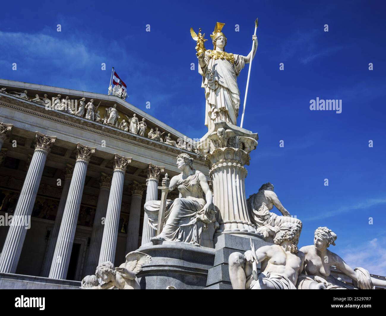 The parliament in Vienna, Austria. With the statue of Pallas Athena ...