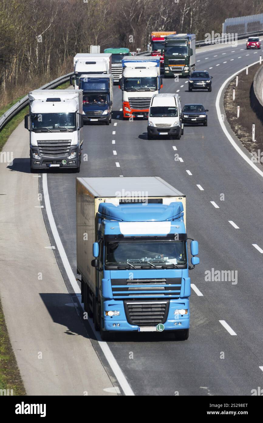 Trucks on the motorway. Road transport for goods. Austria Stock Photo ...