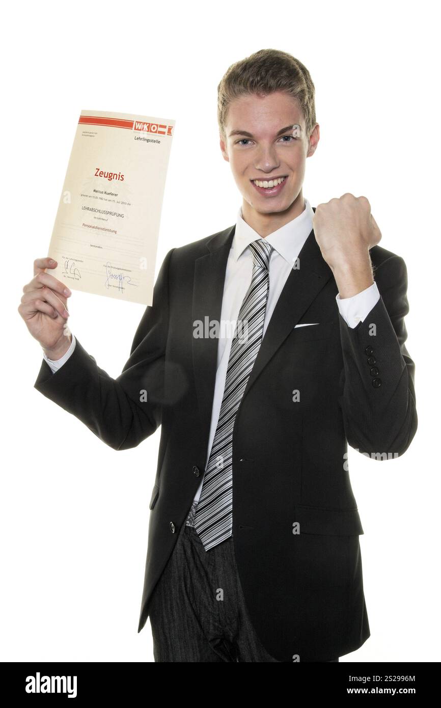 A young man successfully passes his final apprenticeship examination ...