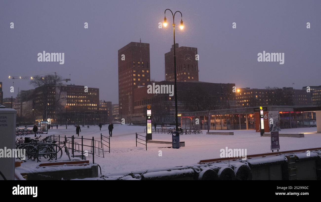 Oslo, Norway. 6th Jan, 2025. Pedestrians walk on a street in snow in ...