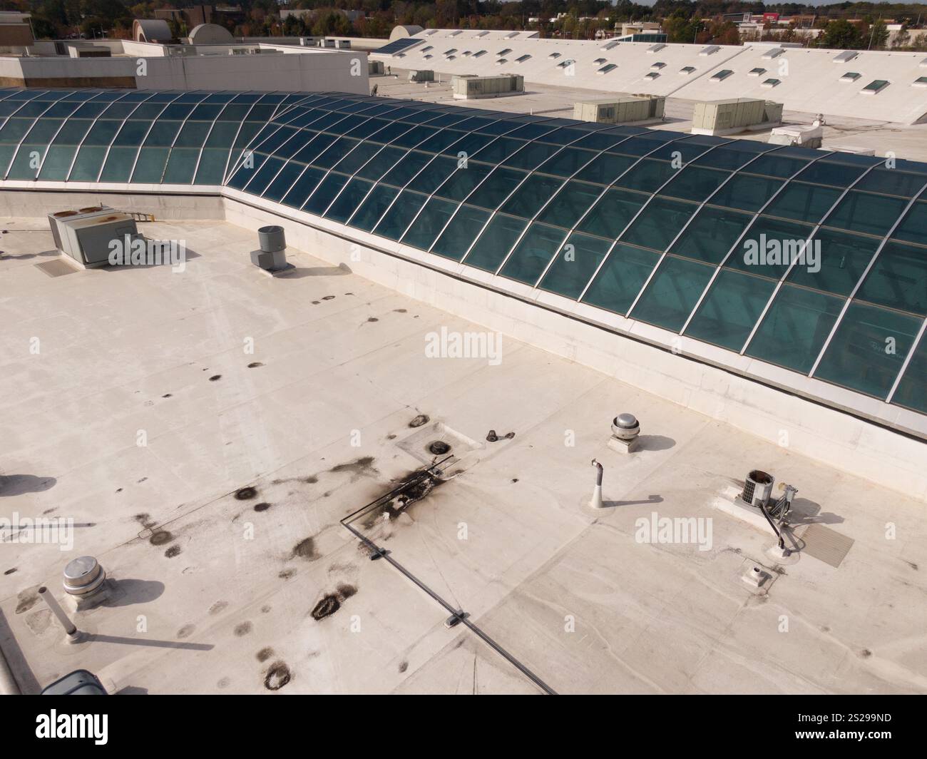 Day Time Drone Images of Large Commercial Building With a TPO Roof and ...