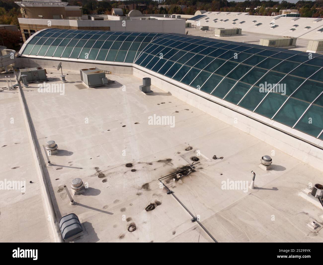 Day Time Drone Images of Large Commercial Building With a TPO Roof and ...