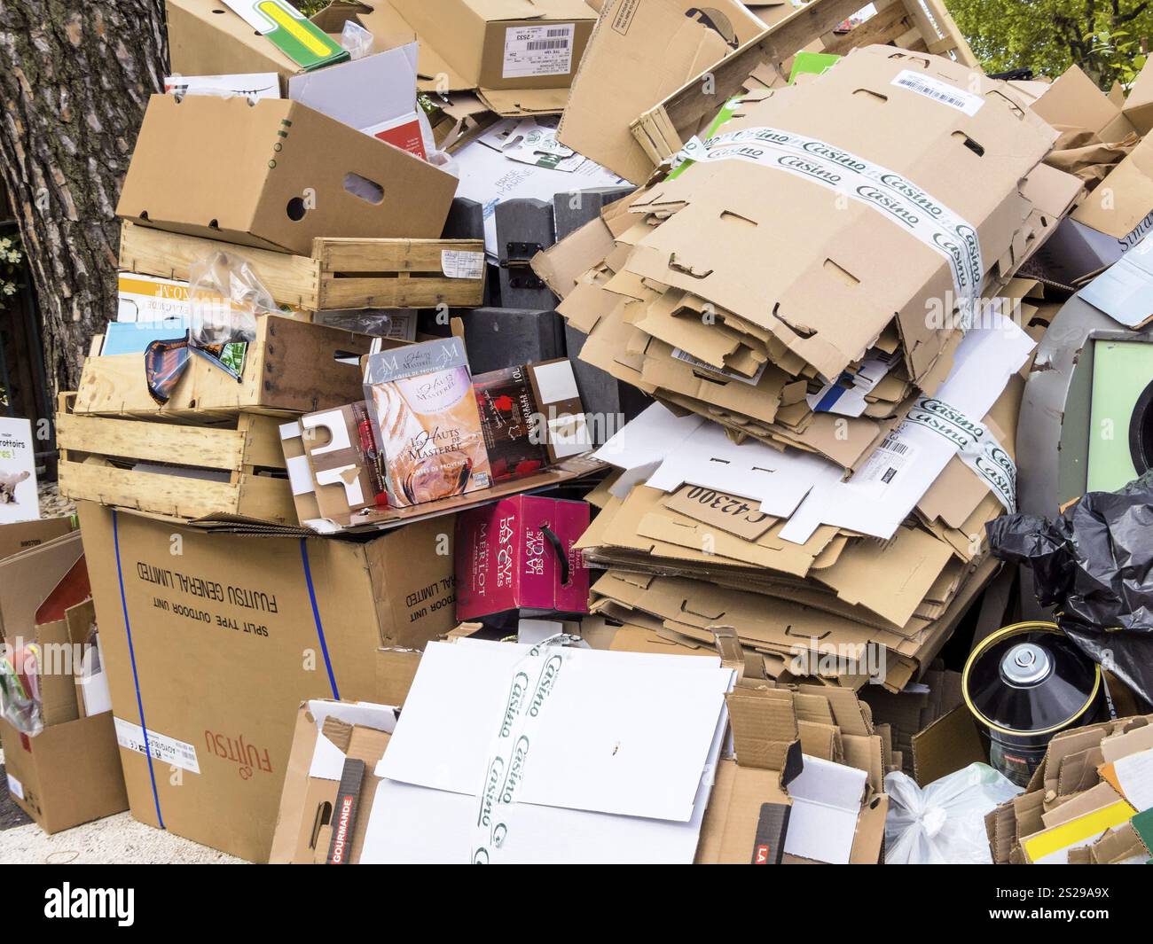 Mountains of cardboard on the street Waste paper from packaging is ...