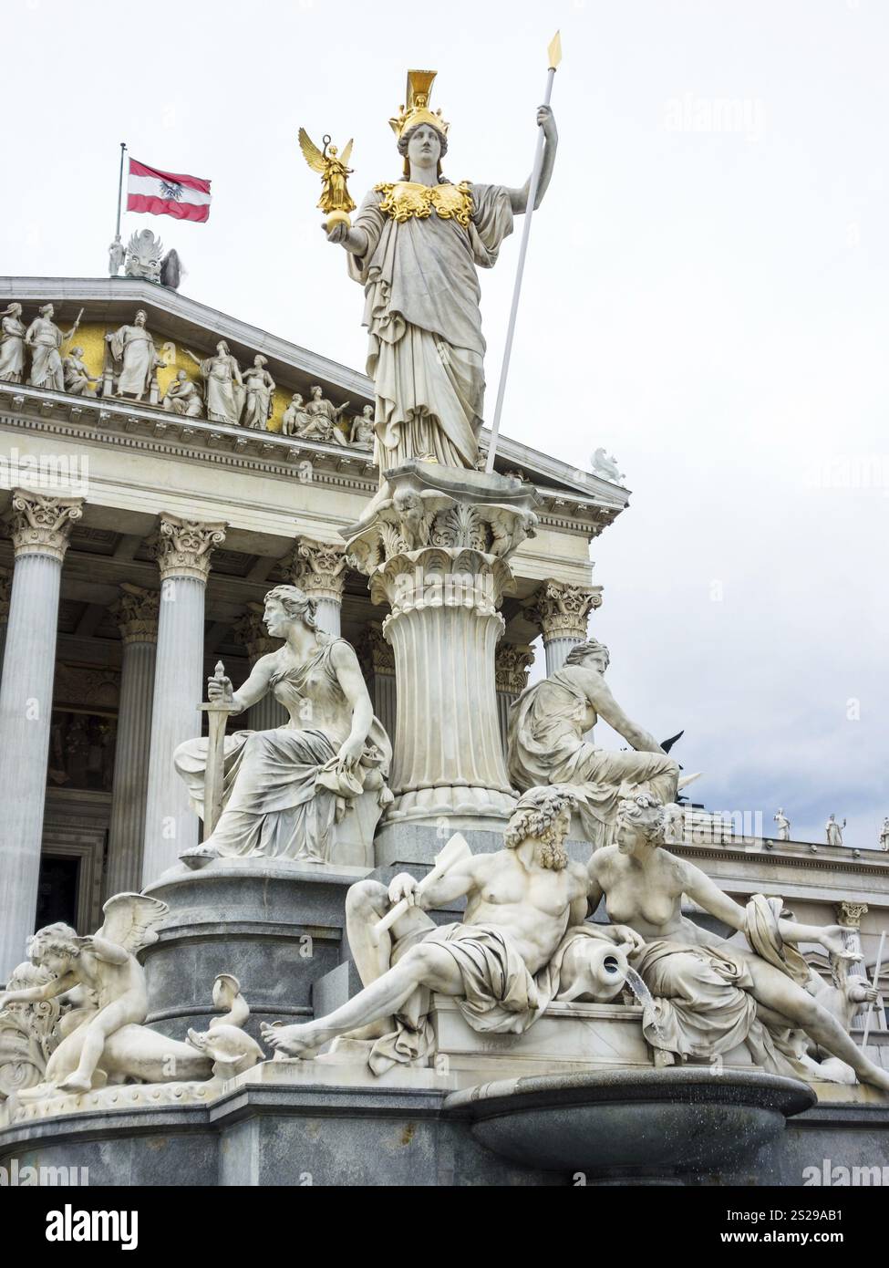 The parliament in Vienna, Austria. With the statue of Pallas Athena ...